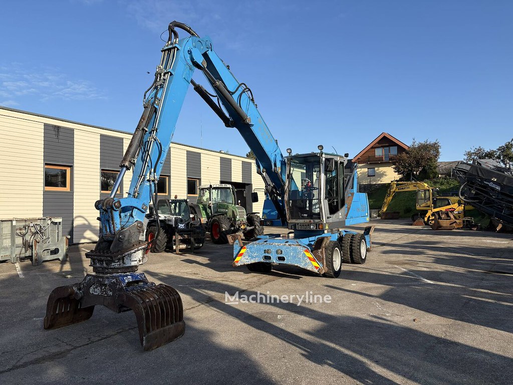 Terex-Fuchs MHL 320 bager za pretovar