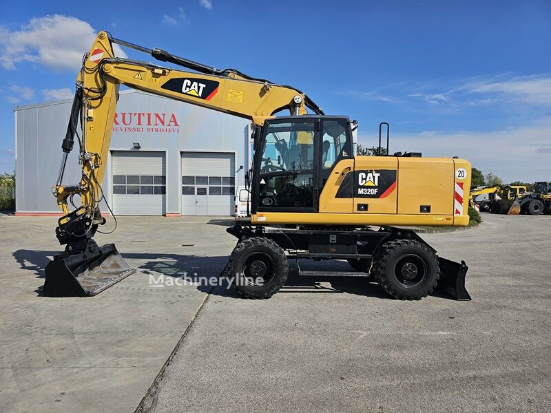 Caterpillar M320F bager točkaš