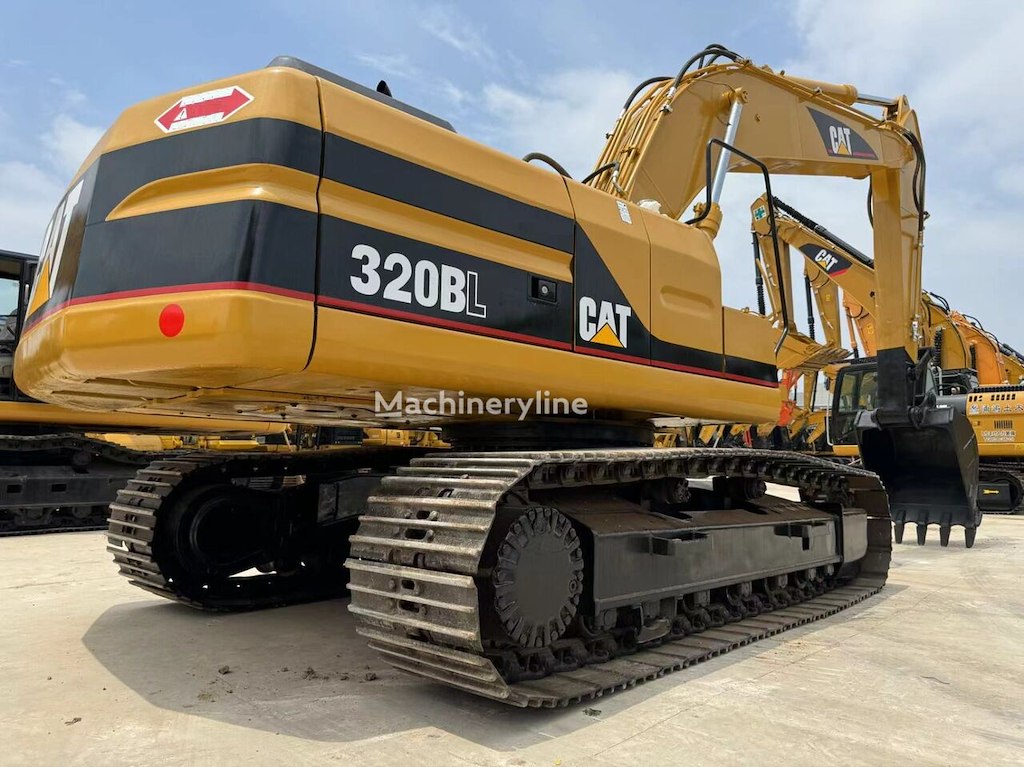 Caterpillar 320BL bager guseničar