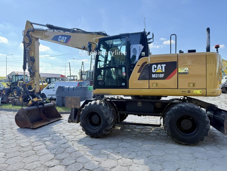 Caterpillar M318F bager točkaš
