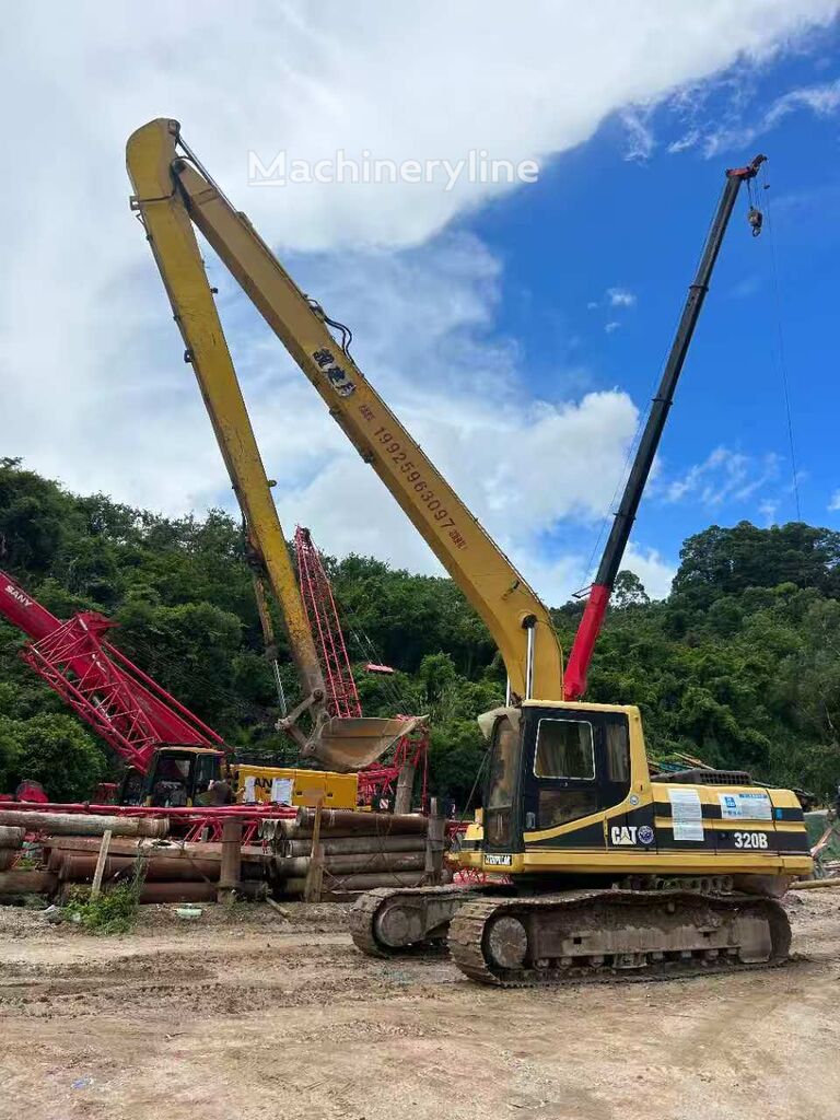 Caterpillar 320BL bager za pretovar