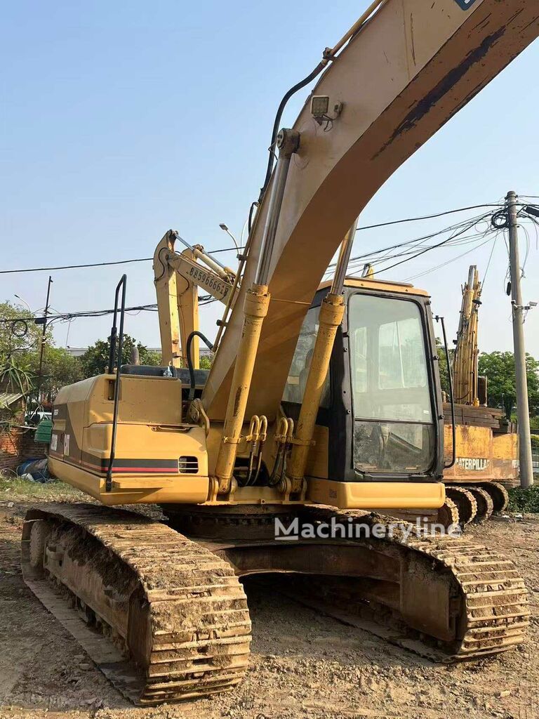Caterpillar 320BL bager guseničar