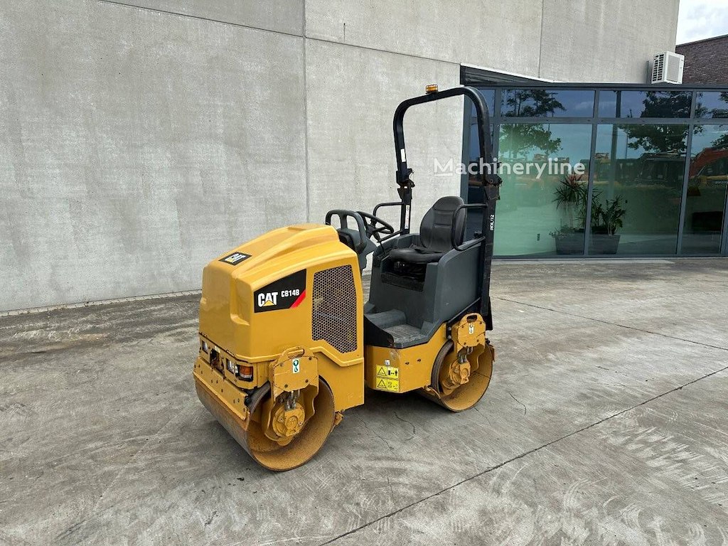 Prodaje se Caterpillar CB14B valjak za asfalt na aukciji