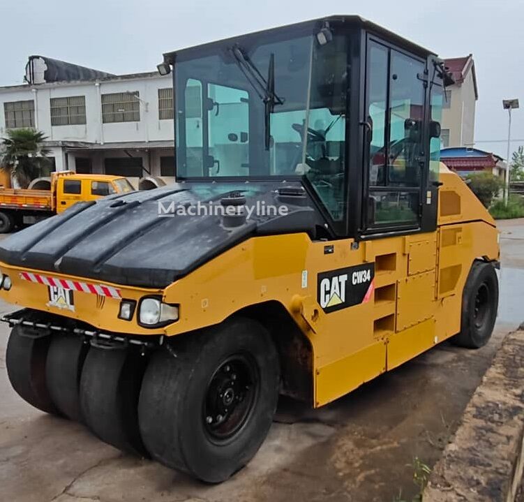 Caterpillar CW34XI pneumatski valjak