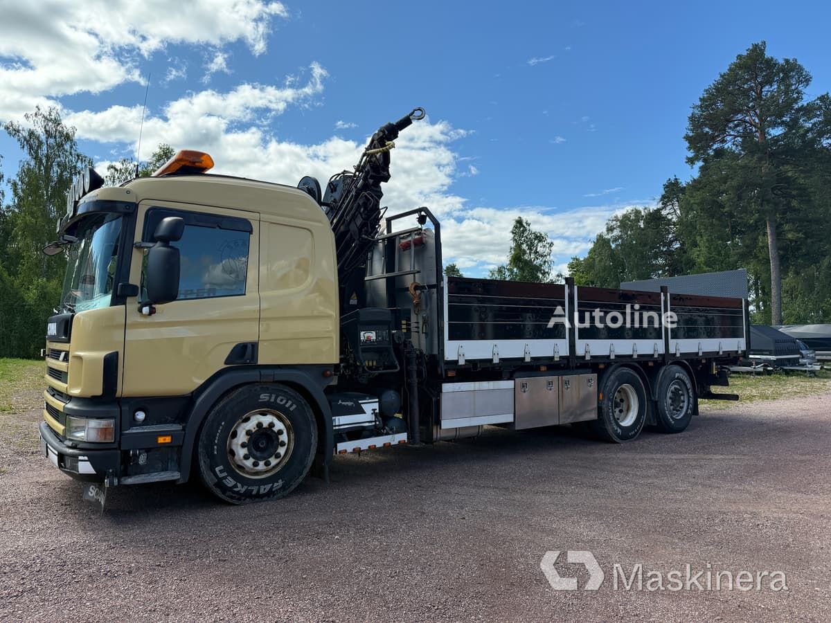 Prodaje se Scania 114G kamion s ravnom platformom na aukciji