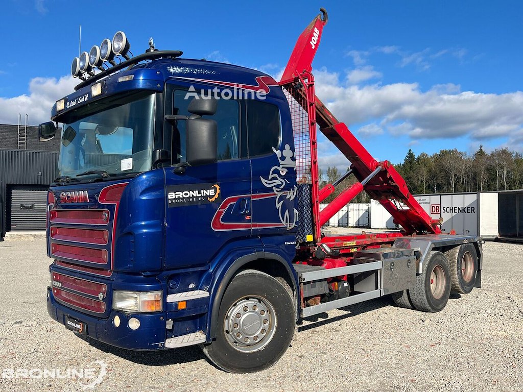 Prodaje se Scania R500 rol kiper sa kukom na aukciji