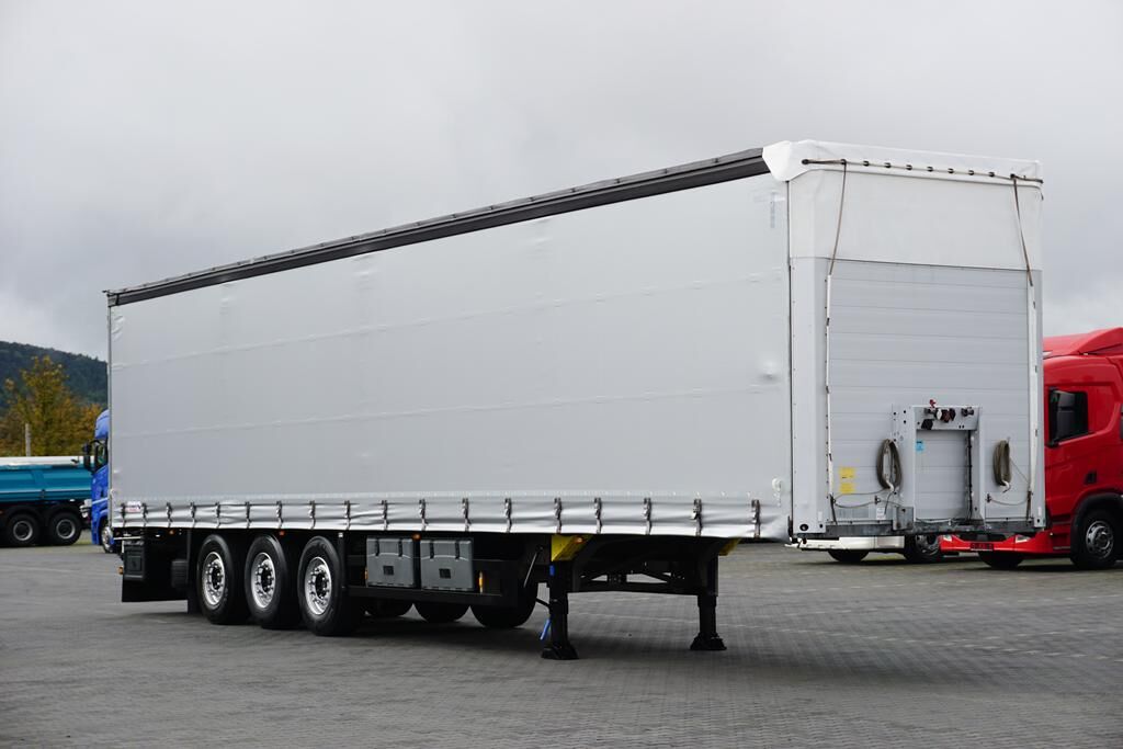 Schmitz Cargobull FIRANKA / MULTI LOCK / XL / OŚ PODNOSZONA poluprikolica sa kliznom ceradom