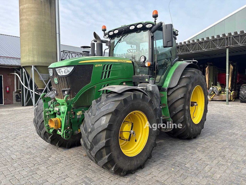 Prodaje se John Deere 6215R traktor točkaš na aukciji