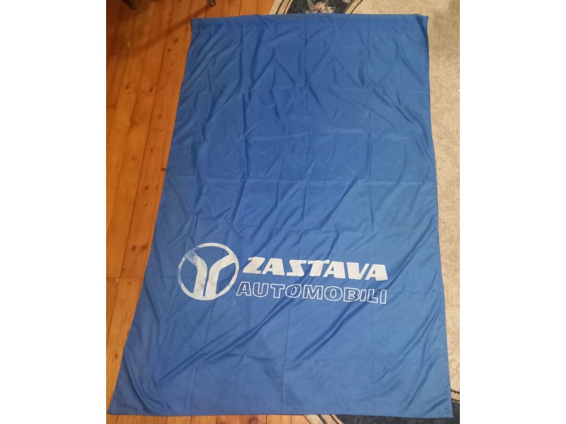 Zastava sa logom i natpisom ZASTAVA AUTOMOBILI
