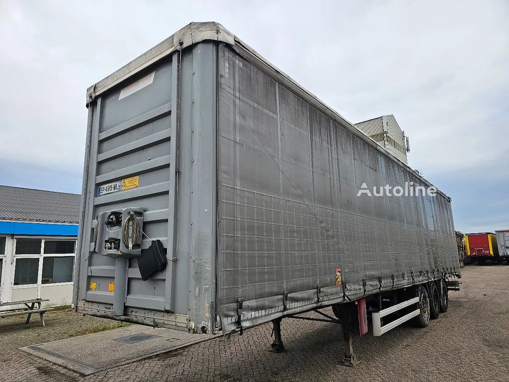 Fruehauf FKSRT4CN - SAF - DISC poluprikolica sa kliznom ceradom