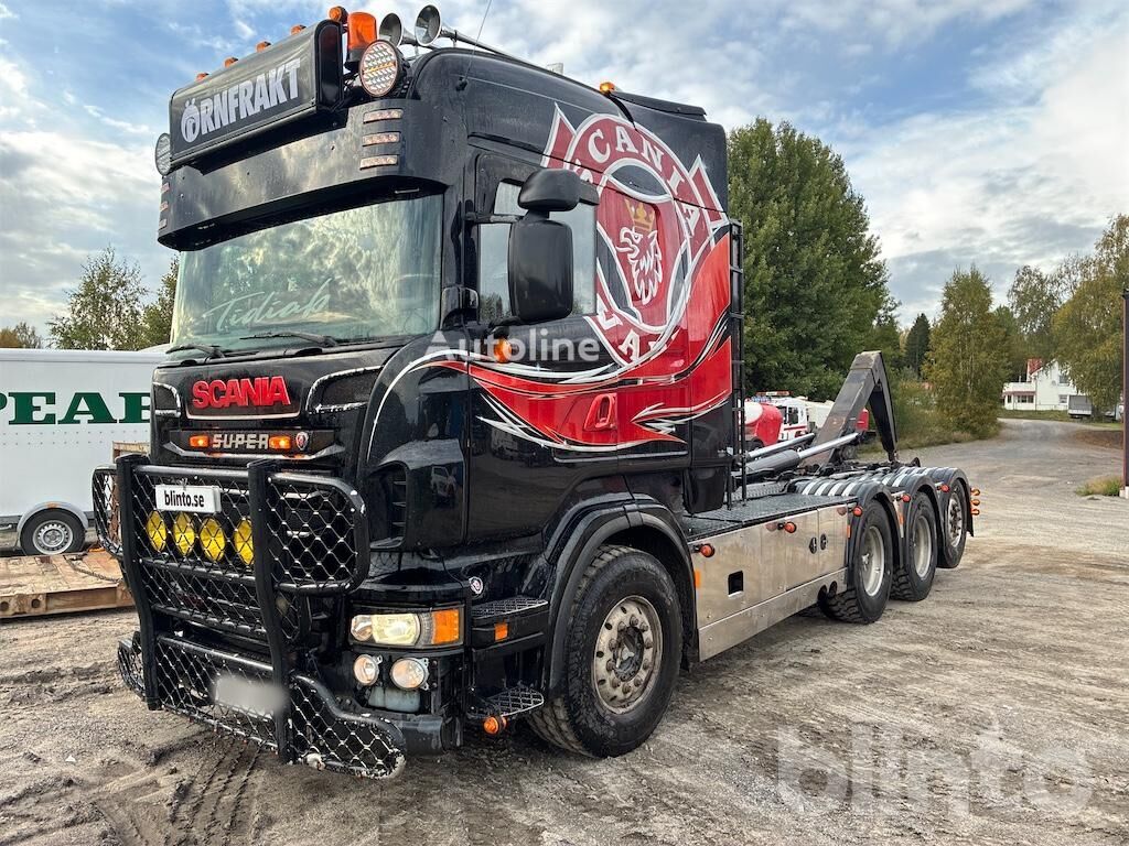 Prodaje se Scania R620 rol kiper sa kukom na aukciji