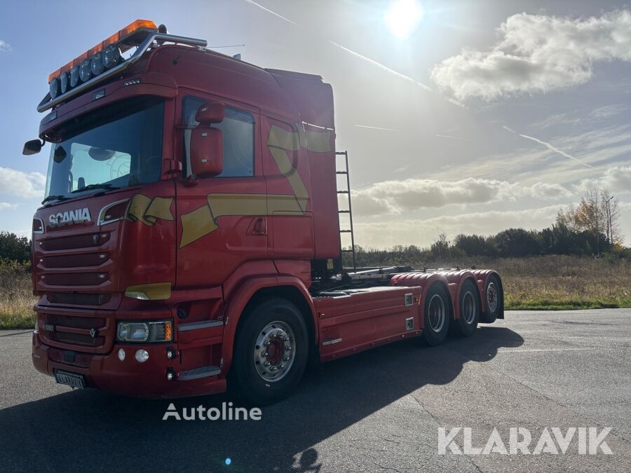 Prodaje se Scania R580 rol kiper sa kukom na aukciji