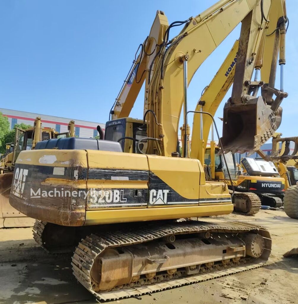 Caterpillar 320BL bager guseničar