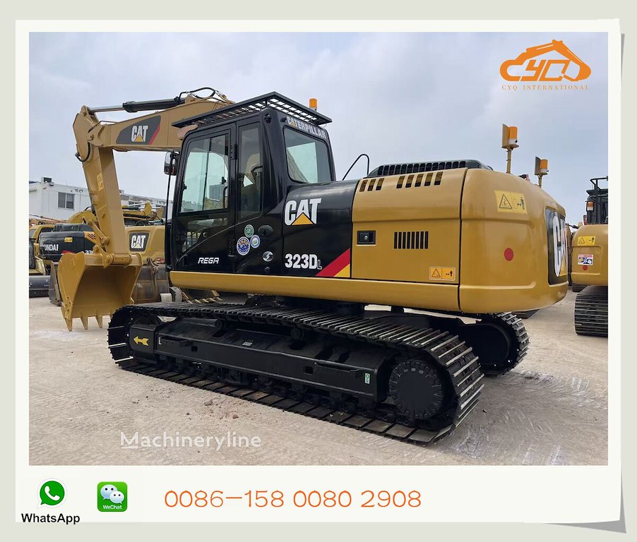 Caterpillar 323DL bager guseničar