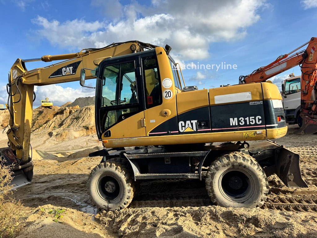 Caterpillar M 315 C bager točkaš