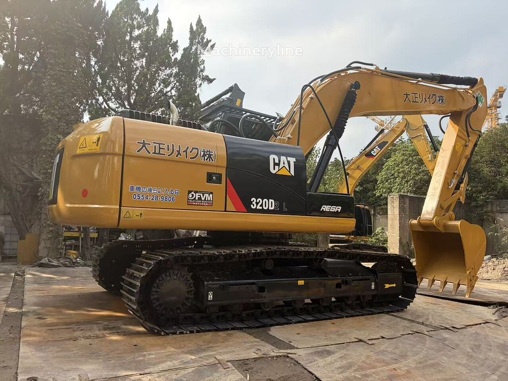 Caterpillar 320DL bager guseničar