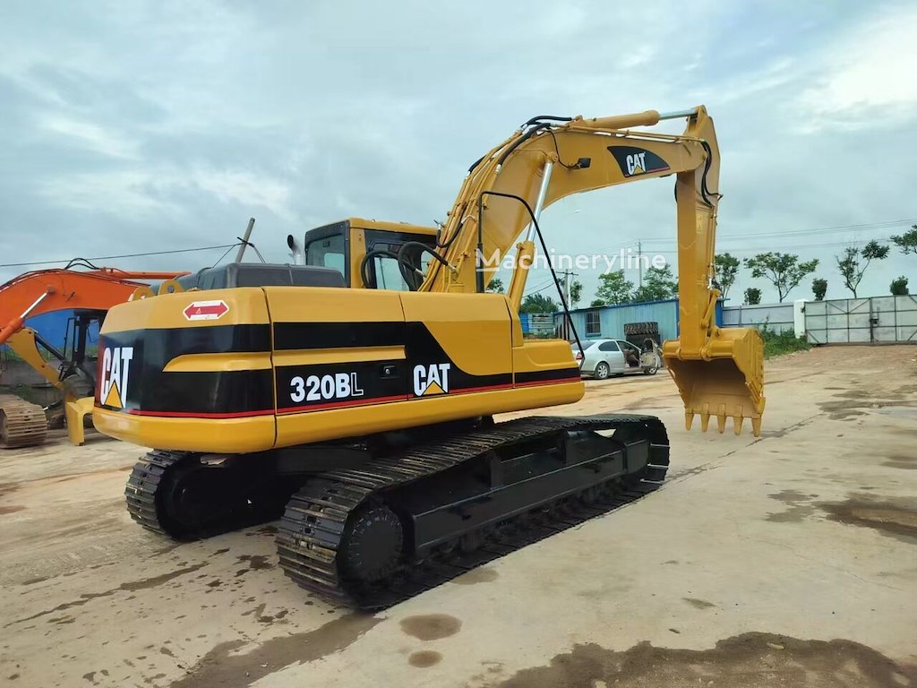Caterpillar 320BL bager guseničar