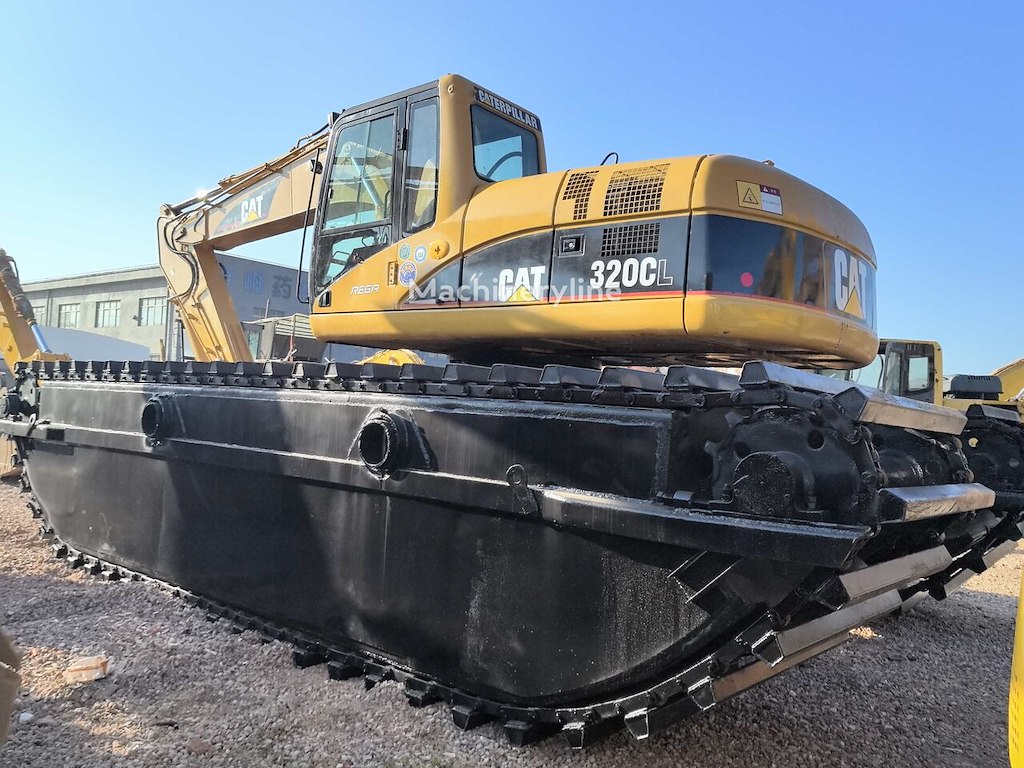 Caterpillar 320CL bager amfibija
