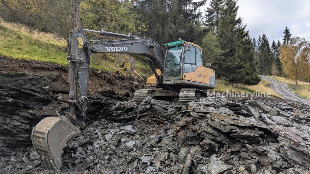 Prodaje se Volvo EC140CL med hogstaggregat, skuffer og tømmerklo bager guseničar na aukciji