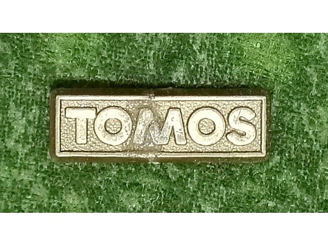 TOMOS.