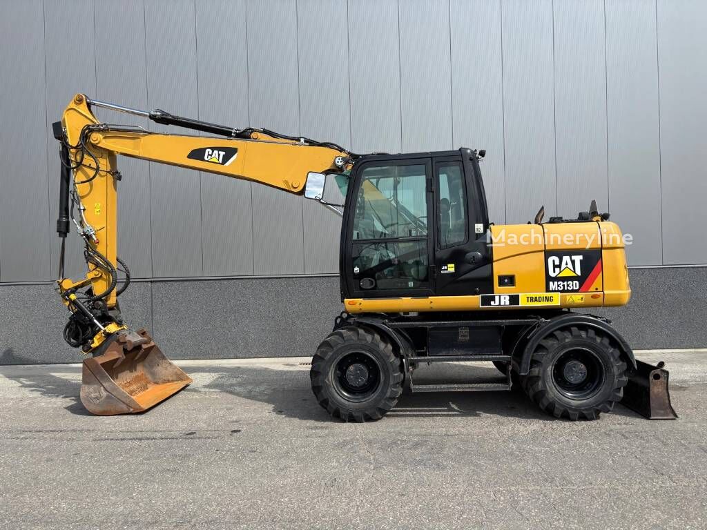 Caterpillar M 313 D bager točkaš
