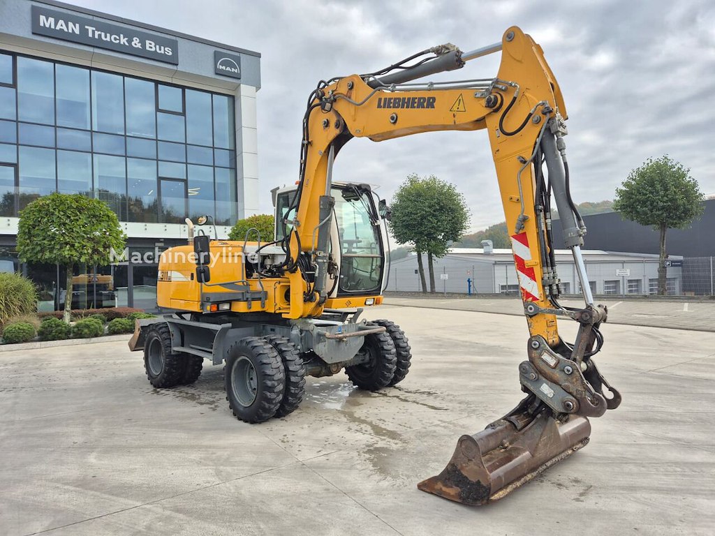 Liebherr A311 LITRONIC bager točkaš