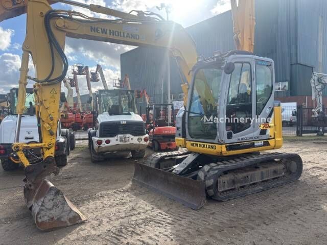 New Holland E 70 B SR midi bager