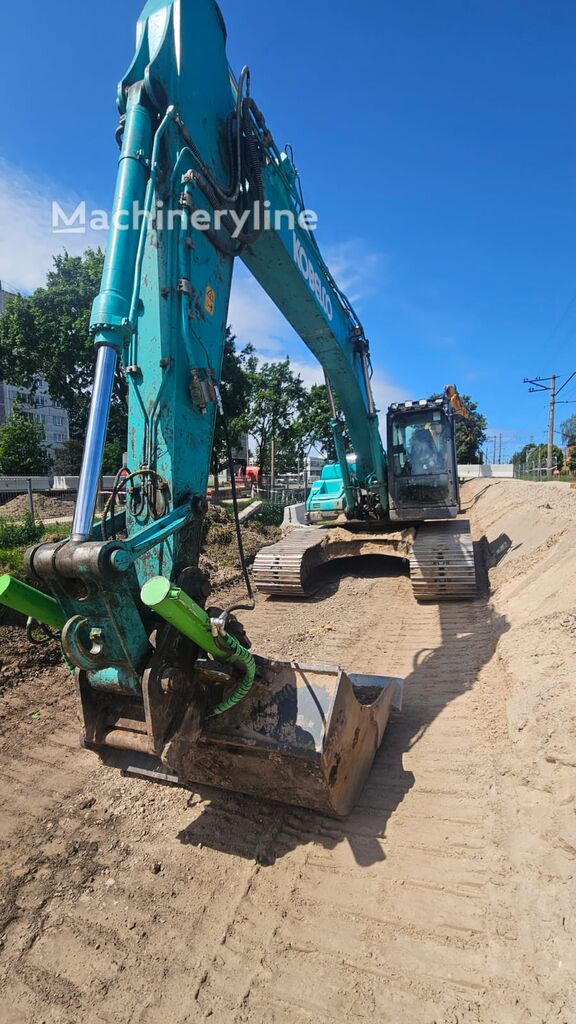 Kobelco SK210 LC bager guseničar