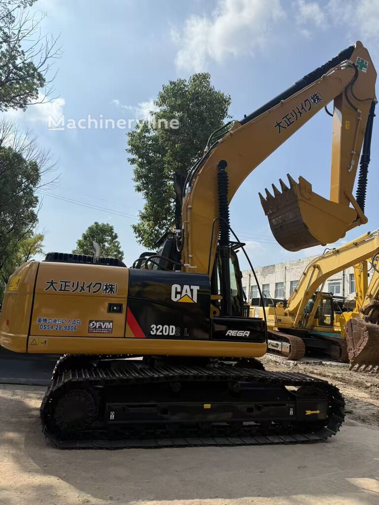 Caterpillar 320DL bager guseničar