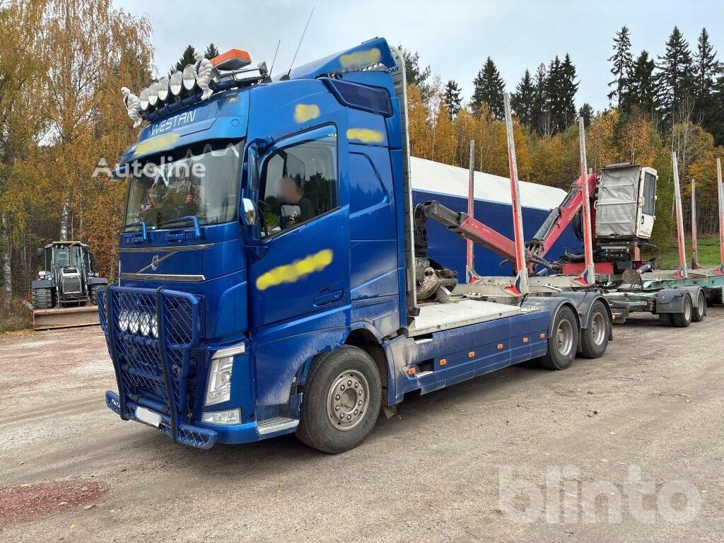 Prodaje se Volvo FH 64R kamion za prevoz drva na aukciji + šumarska prikolica
