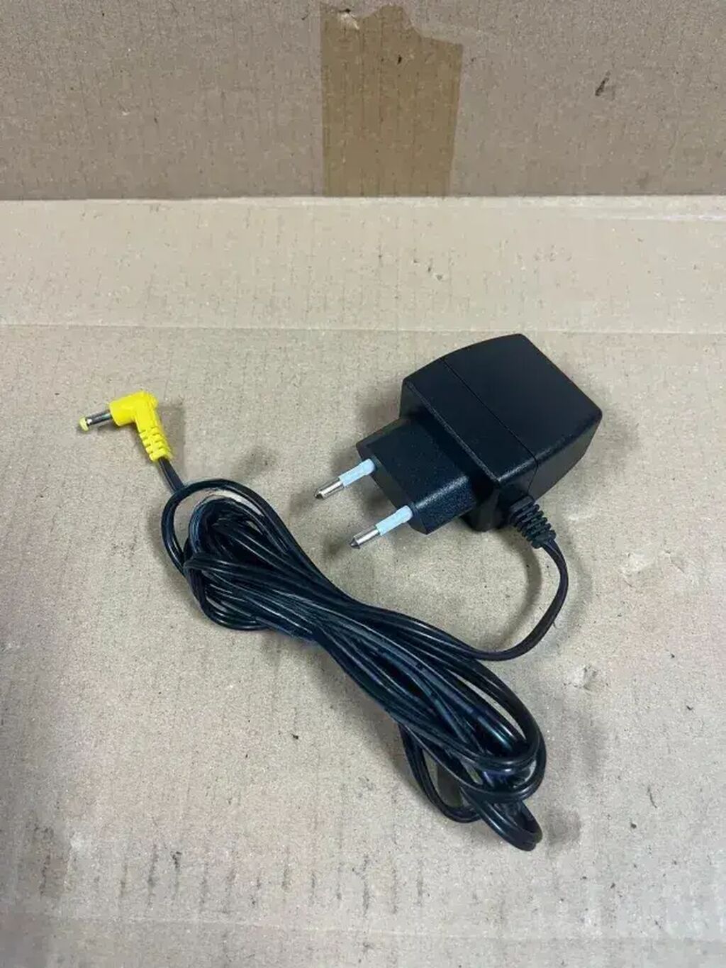 #2915 Orginalni punjač za SENNHEISER slušalice; AC/DC ADAPTER; Model