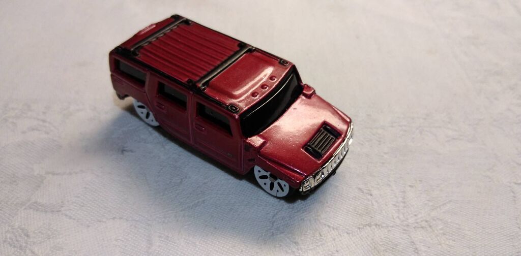 Burago Hummer H2 oko 1:60 (7 cm.) China,ocuvan
