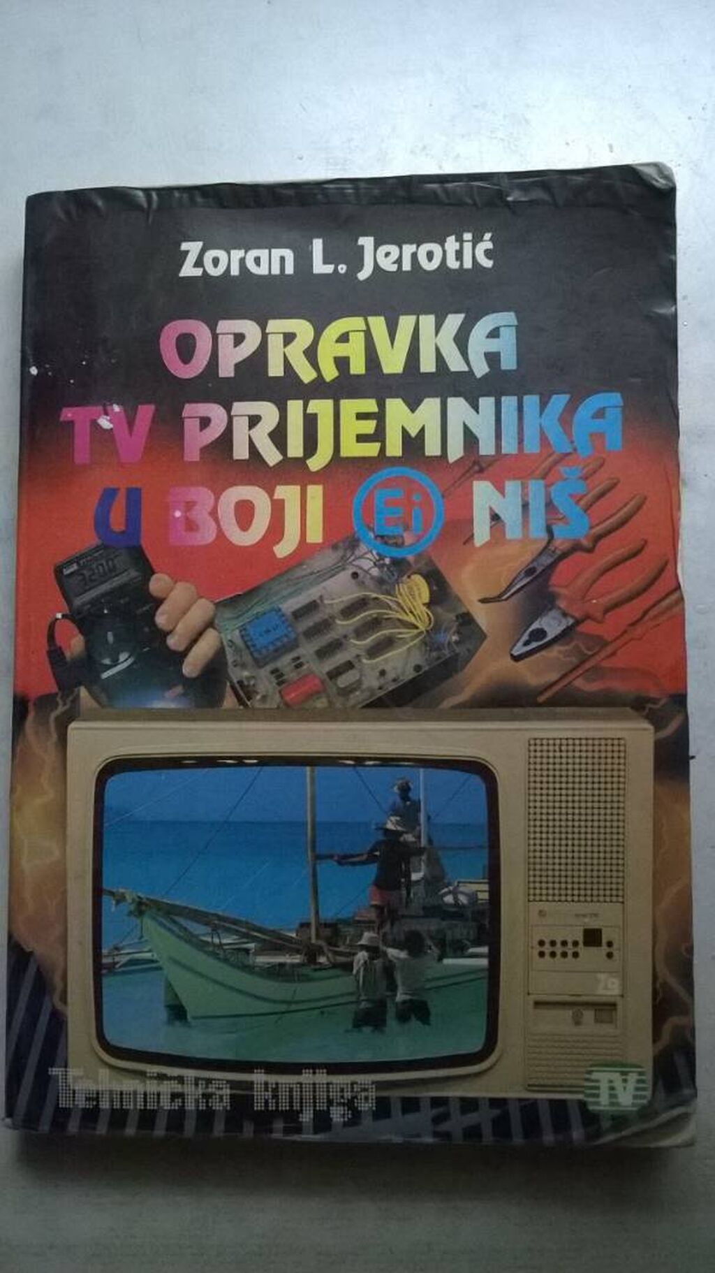 Tehnička knjiga:Opravka TV prijemnika u biji EI 1989. 219 str. sa