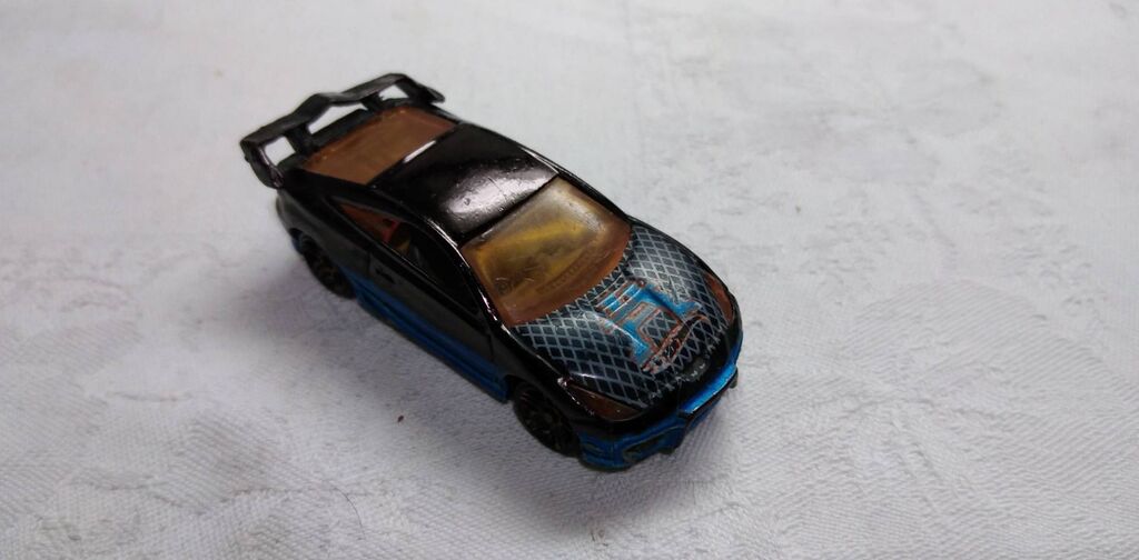 Hot Wheels Toyota Celica,oko Malaysia malo izgreban III