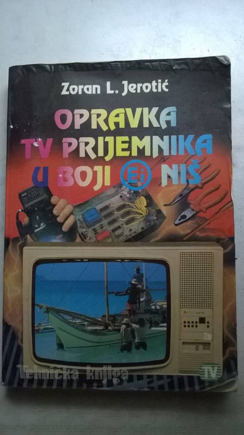 Tehnička knjiga:Opravka TV prijemnika u biji EI 1989. 219 str. sa