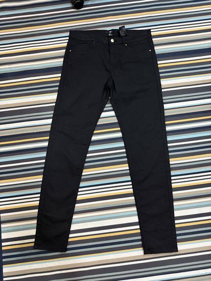 Nove H&M crne pantalone L