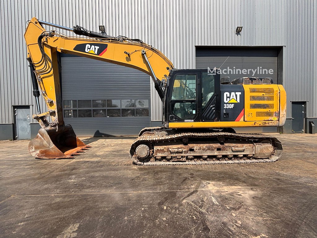 Caterpillar 330FL bager guseničar