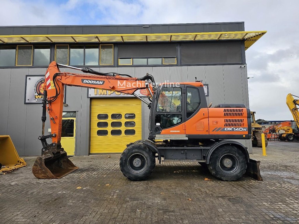 Doosan DX 140W bager točkaš