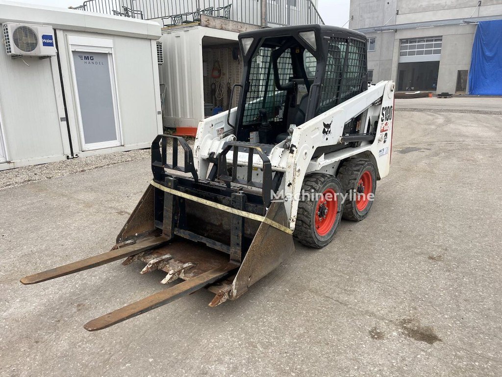 Bobcat S100 mit Schaufel und Gabel mini utovarivač