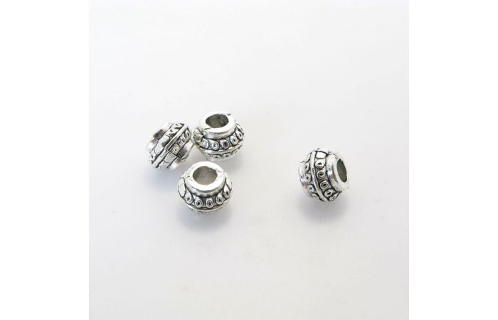 Metalna perla 8,5 x 6,5 mm, rupa oko 3.5 mm- boja antik srebra ( R154AS )