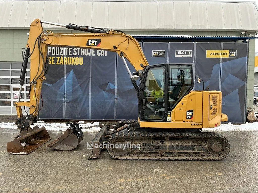 Caterpillar 310 midi bager