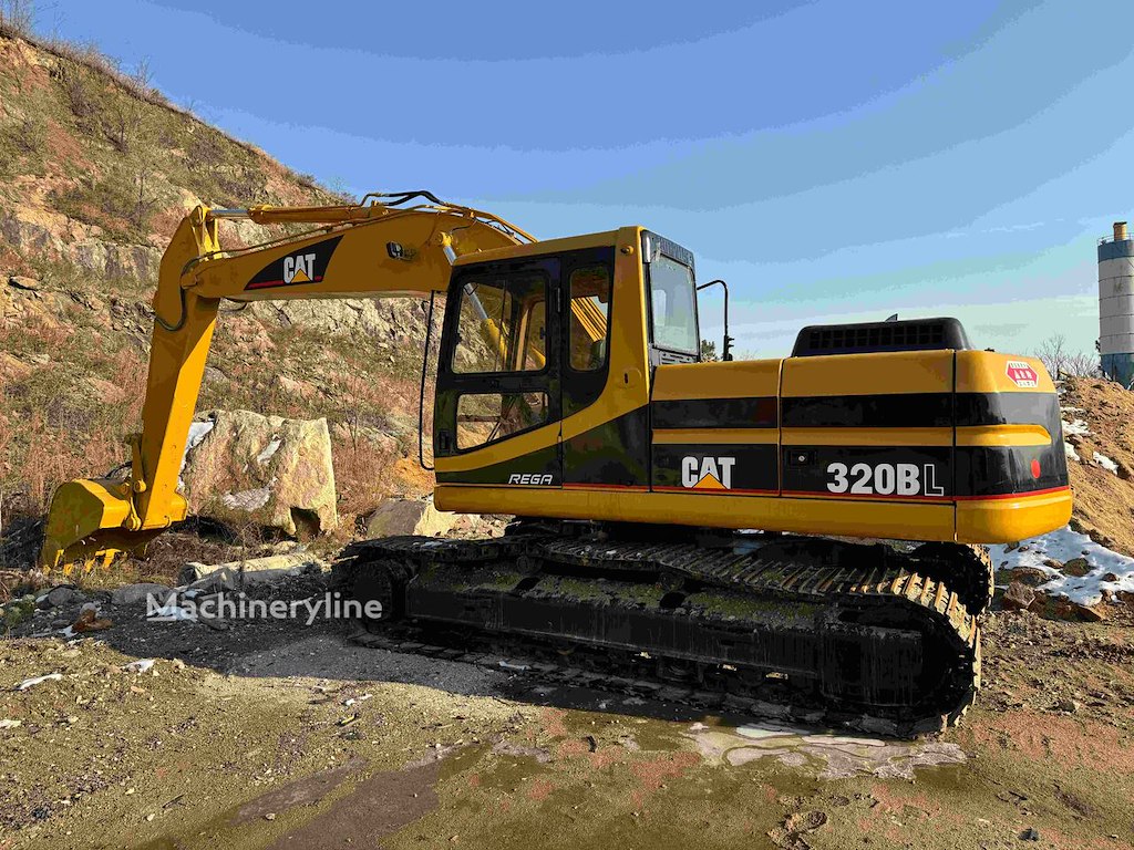 Caterpillar 320BL bager guseničar