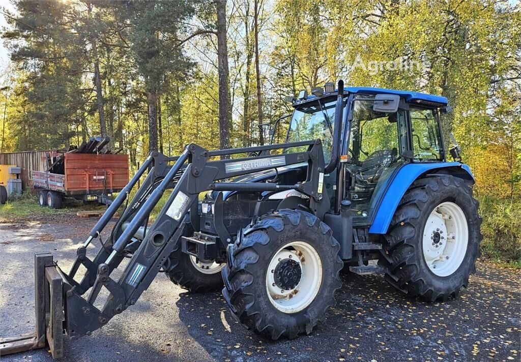New Holland TL100,Etukuormain, Perävaunu, Takalana, Kyntö traktor točkaš