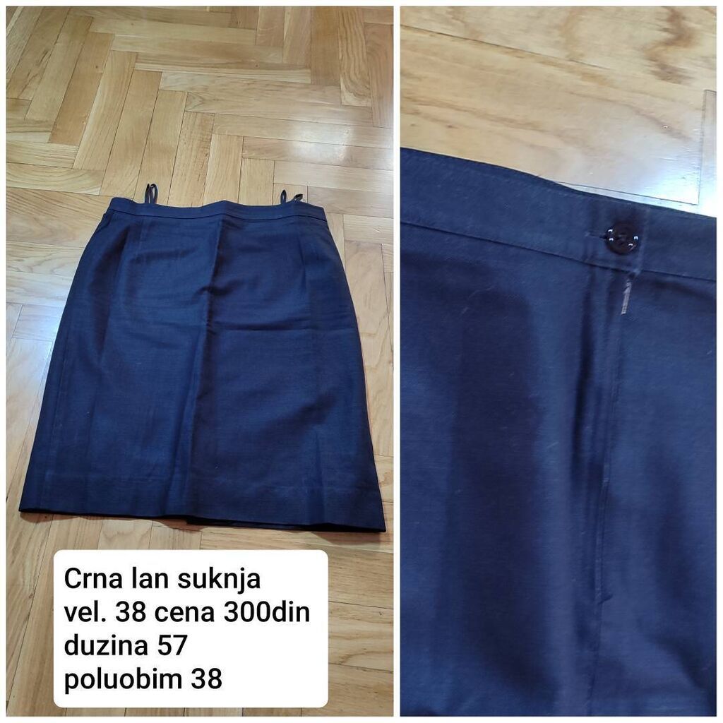 Crna lanena suknja, klasičnog kroja do kolena. - Veličina: 38 -