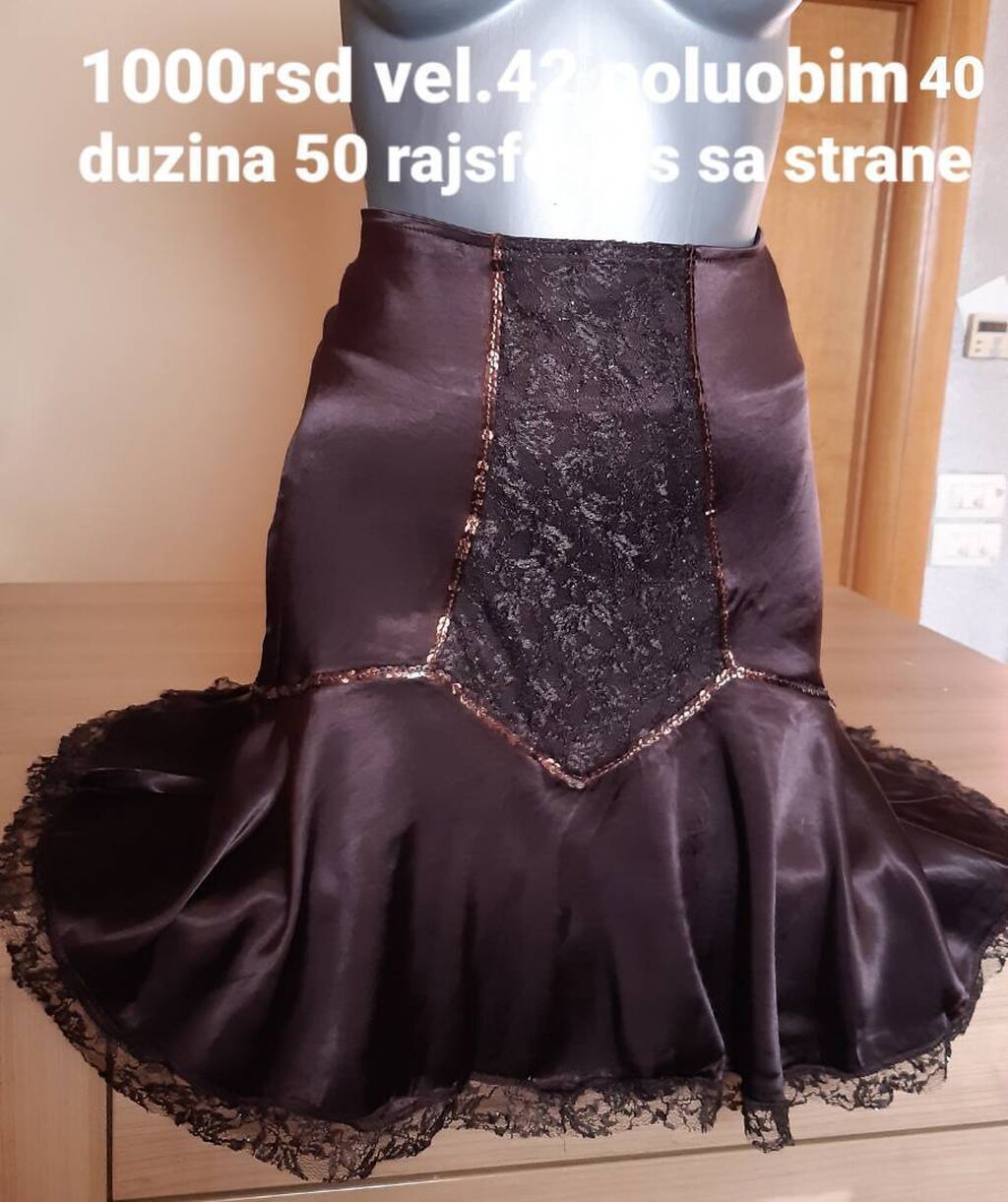 Ženska suknja GIĖNT, vel. 42 - Materijal: sjajni satenski izgled sa