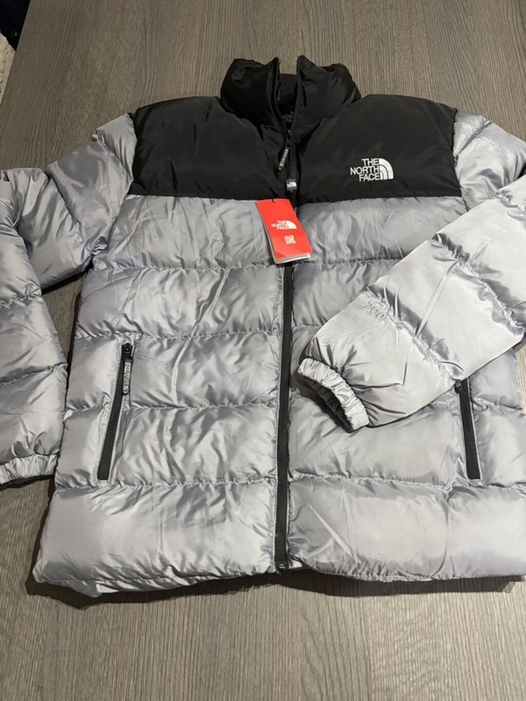 The North Face muška puffer jakna - Dva kolor dizajna: sivo-crna i