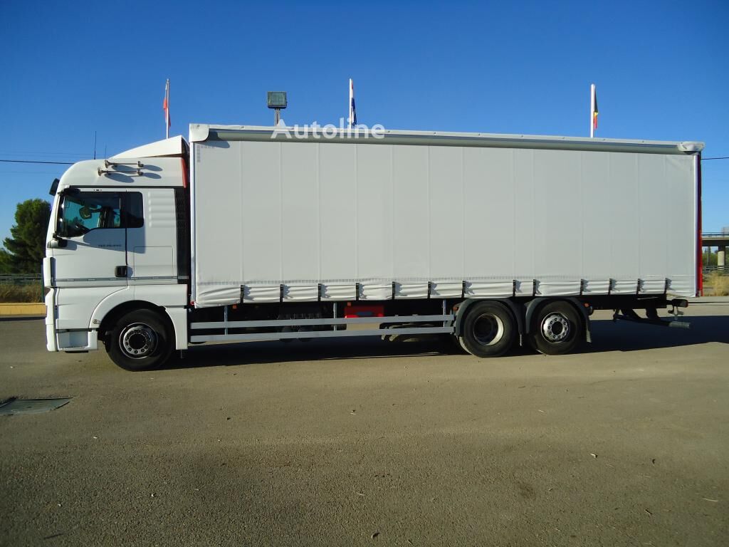 MAN TGX 26 440 kamion sa klizna zavesa cerada