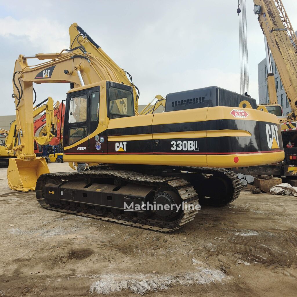 Caterpillar 330BL bager guseničar
