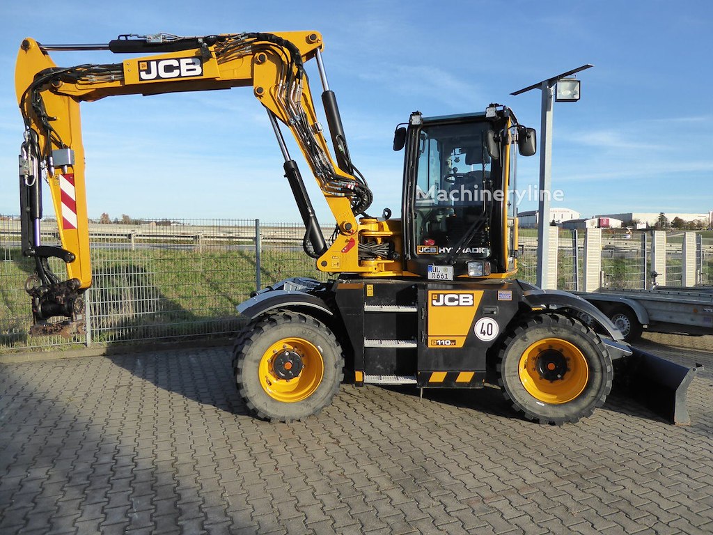 JCB Hydradig 110W mit Powertilt und Löffelpaket bager točkaš