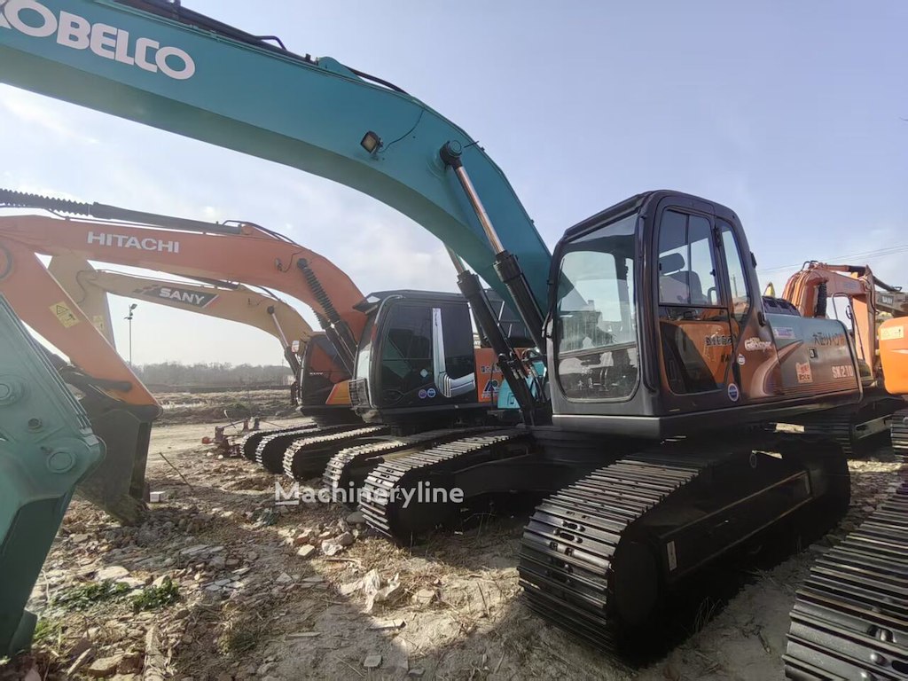 Kobelco SK210 bager guseničar